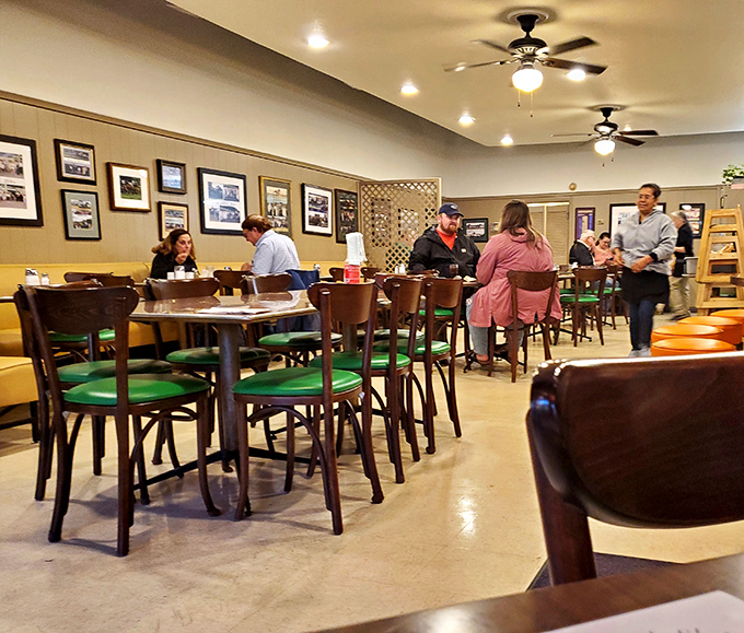 Framed memories line the walls while ceiling fans keep things cool&mdash;this is breakfast with character and comfort combined.