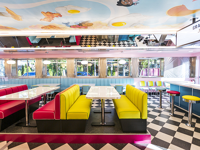 Booths in primary colors that would make Mondrian jealous. This isn't just a diner interior&mdash;it's a mood-lifting color therapy session.