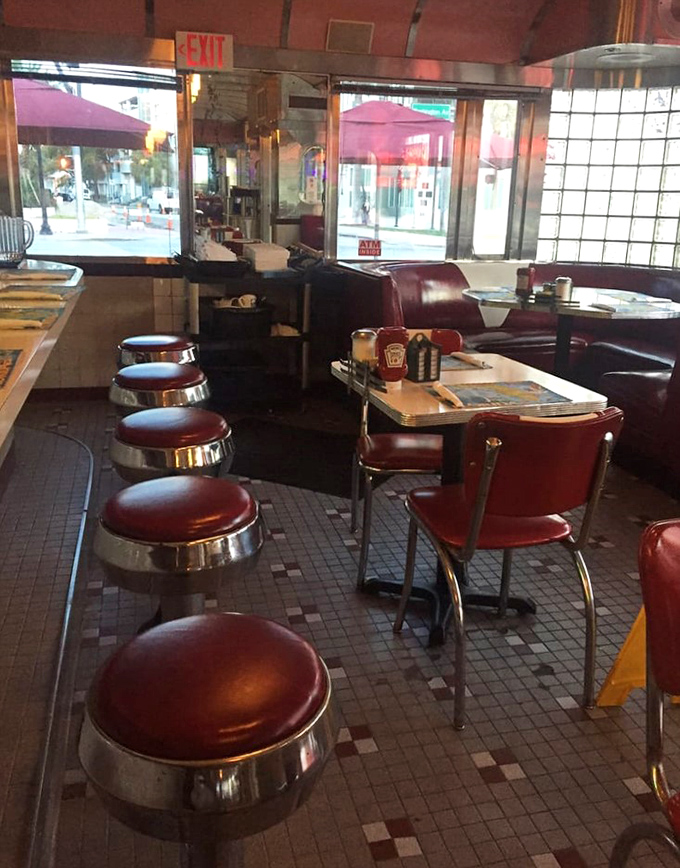 Classic diner counter seating invites solo diners, couples, and new friends to pull up a stool and become part of the 11th Street family.