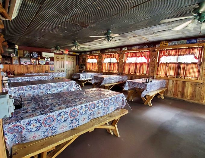 Another dining area awaits with family-style seating, where the wooden tables have hosted countless happy diners and their sauce-stained fingers.