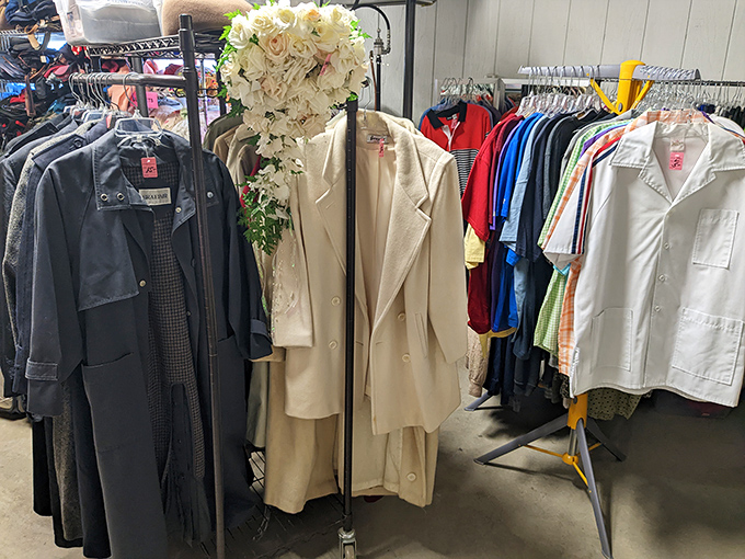 Fashion archaeology at its finest. From classic trench coats to colorful shirts, this rack proves style never truly goes out of fashion.