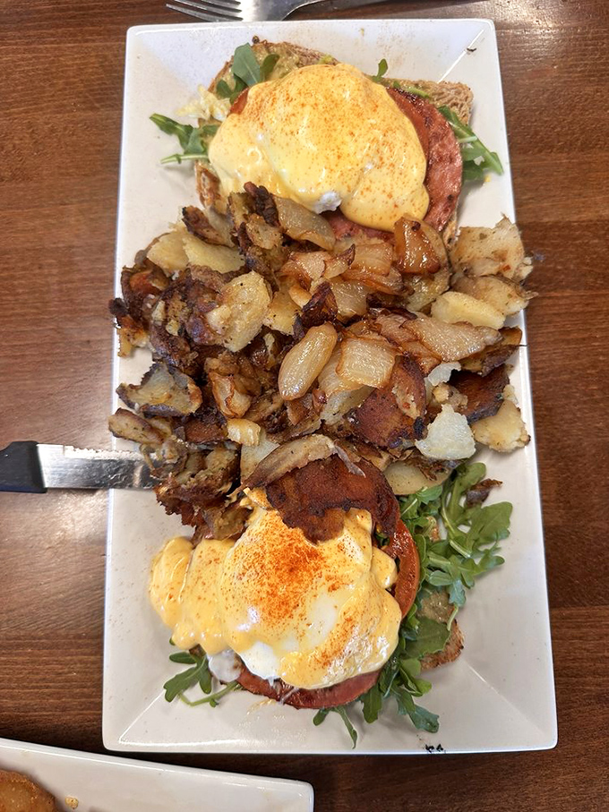 Eggs Benedict gets the avocado treatment, with perfectly poached eggs wearing hollandaise jackets atop a bed of crispy potatoes.