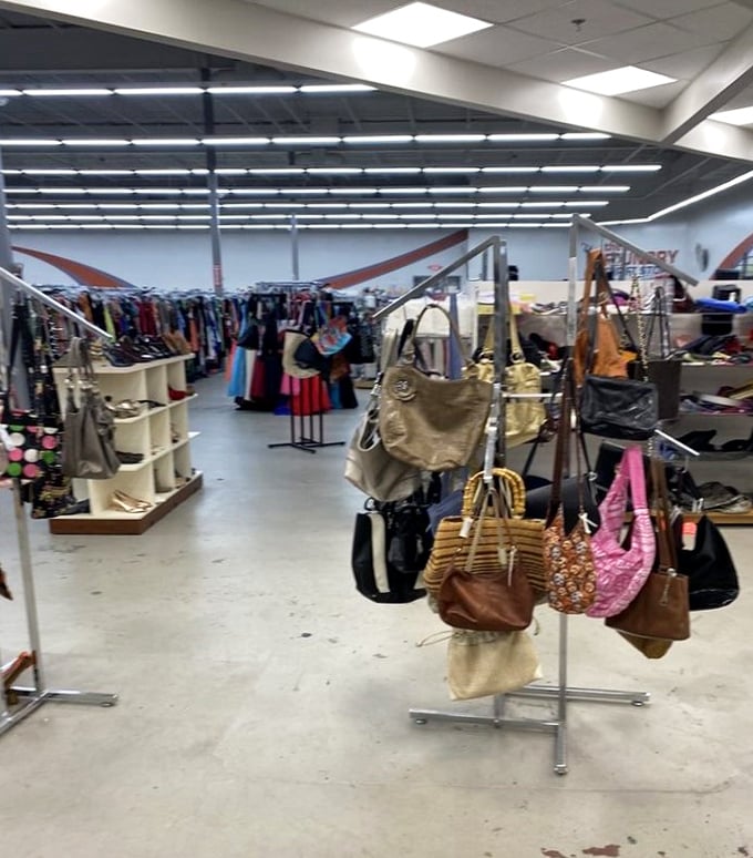 Handbag heaven! From practical totes to statement purses, each one hanging like a story waiting to be continued by its next owner.