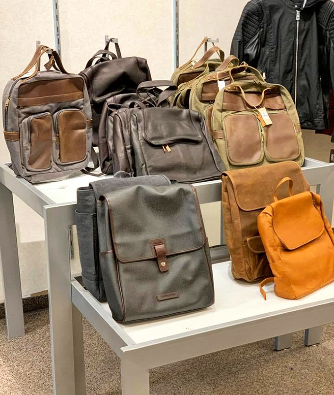 Leather bag heaven for the organizationally obsessed. Each one silently judges your current worn-out backpack from their pristine display.