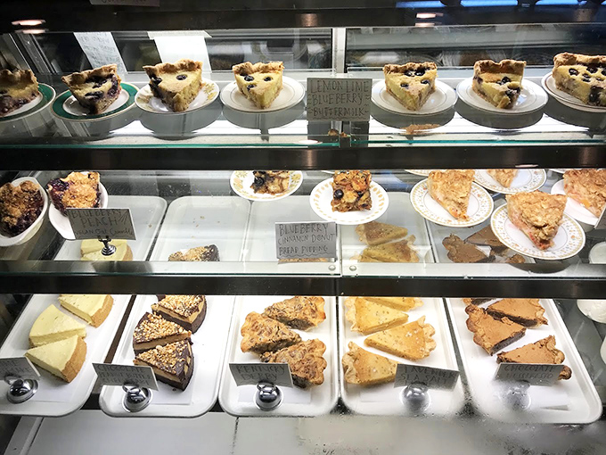 A dessert case that turns willpower into a theoretical concept&mdash;each slice a reason to skip the beach diet for one more day.