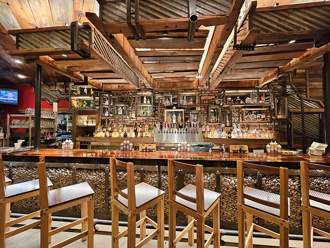 Not just a bar, but a shrine to the liquid companions of great barbecue. Wood, metal, and glass creating the perfect backdrop for spirited decisions.