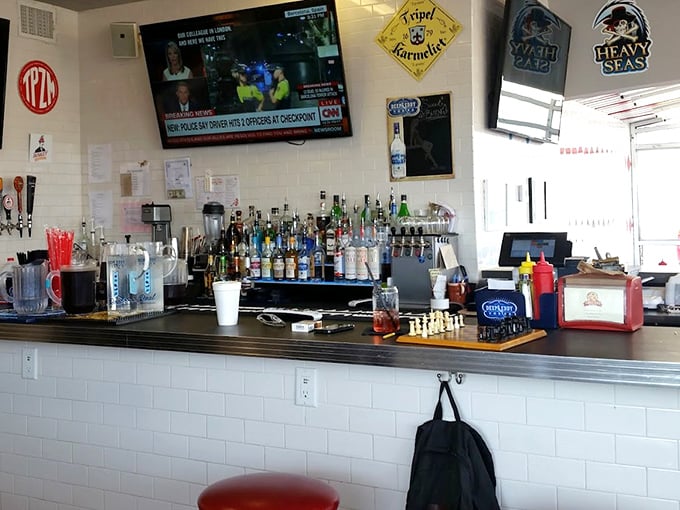 A bar that understands its mission: provide cold drinks, sports on TV, and a counter to lean on while debating the merits of various burger toppings.