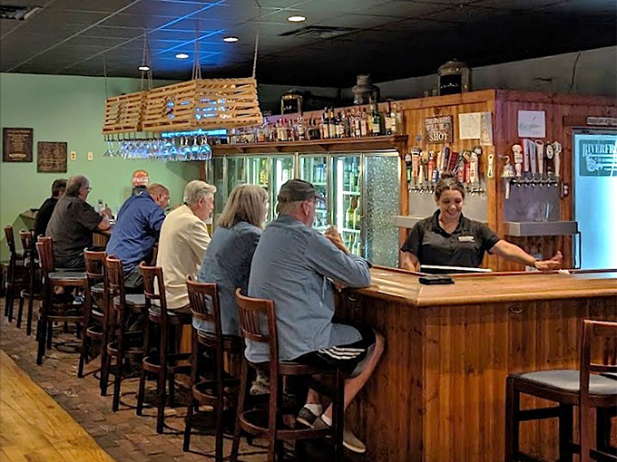 The bar area &ndash; where strangers become friends over cold drinks and hot seafood. Tennessee hospitality meets coastal cuisine.