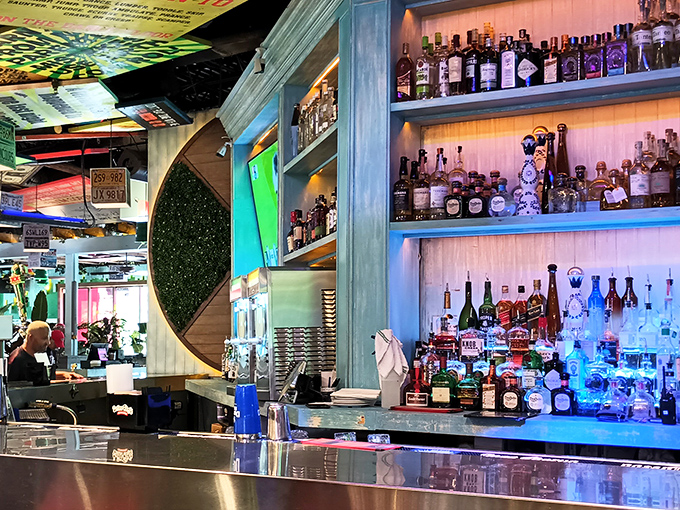 A bar stocked like a liquid rainbow, where the bottles aren't just ingredients&mdash;they're promises of good times ahead.