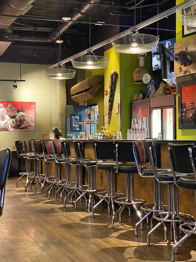 The bar area beckons with promises of creative concoctions. Where else can you sip cocktails while surrounded by such delightfully macabre d&eacute;cor?