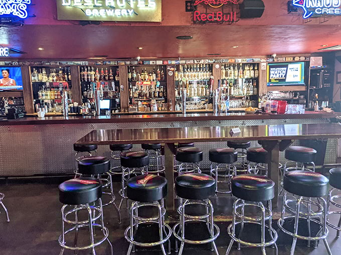 The bar at Lucky 13 &ndash; where strangers become friends and friends become regulars. Beer taps stand ready like soldiers awaiting orders.