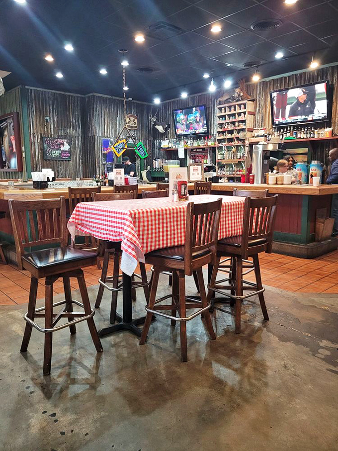 The bar area isn't just serving drinks&mdash;it's offering liquid courage for those still deciding whether to try the gator bites or frog legs.