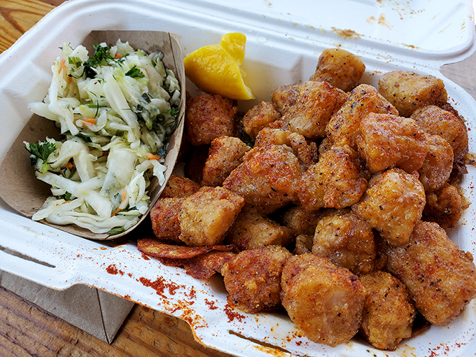 Bay scallops with a golden crust that shatters like caramel on cr&egrave;me br&ucirc;l&eacute;e, proving simple food done right is culinary magic.