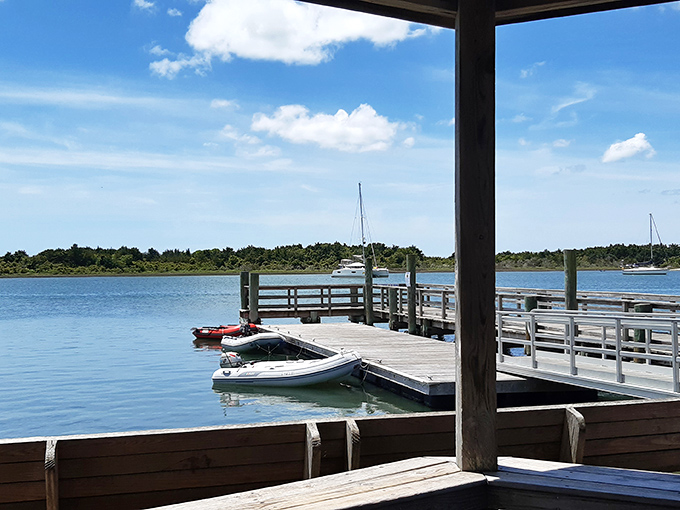 Simple pleasures: a wooden dock, gentle waters, and the promise of adventure just a small boat ride away.
