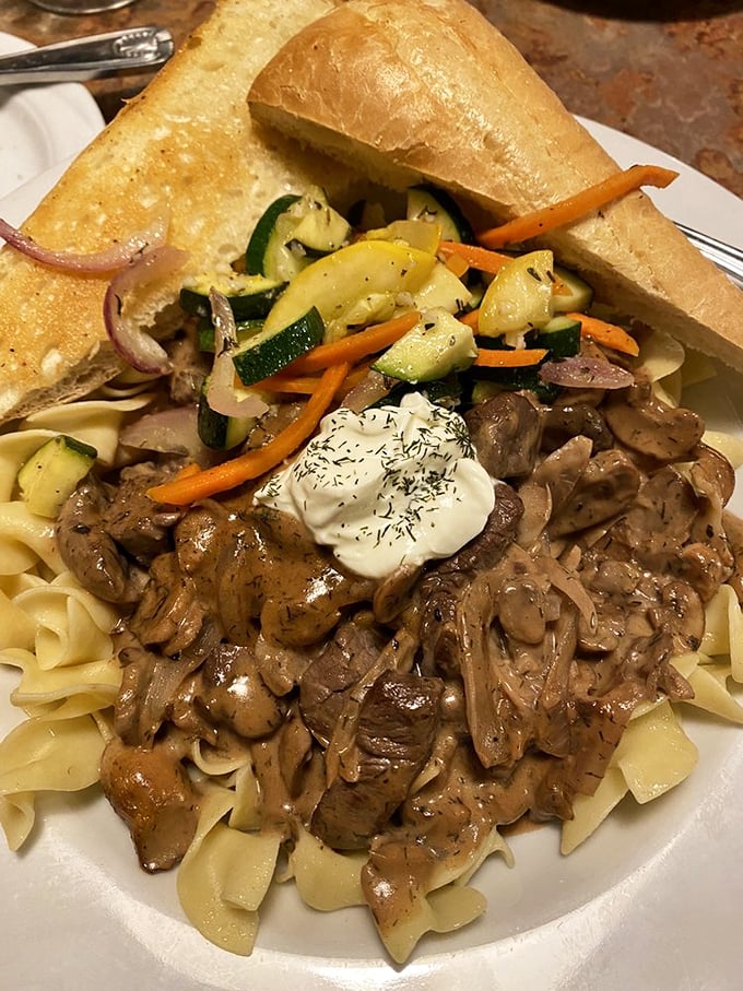 Beef stroganoff that would make a Russian grandmother weep with joy, served over egg noodles with a dollop of sour cream playing the perfect supporting role.