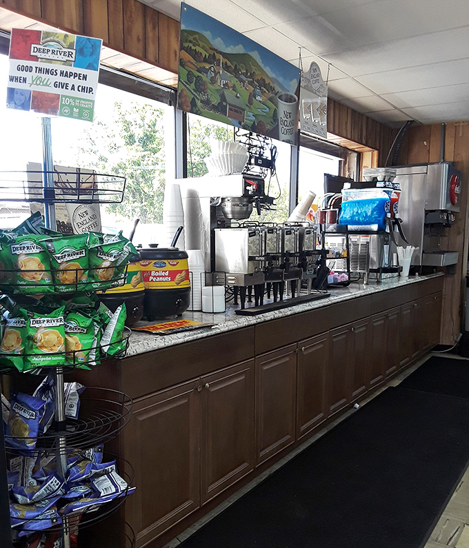 The beverage station &ndash; where coffee and conversation flow freely, fueling both the body and the neighborhood gossip network.