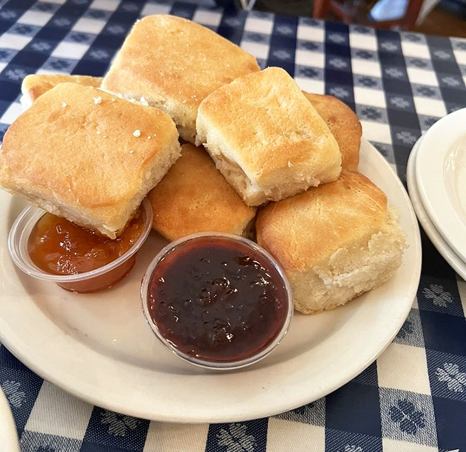 Biscuits so fluffy they could float away if not anchored by those perfect little cups of homemade preserves.