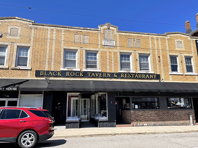 Black Rock Tavern anchors Main Street with the confidence of someone who knows they make a burger worth crossing town for. 
