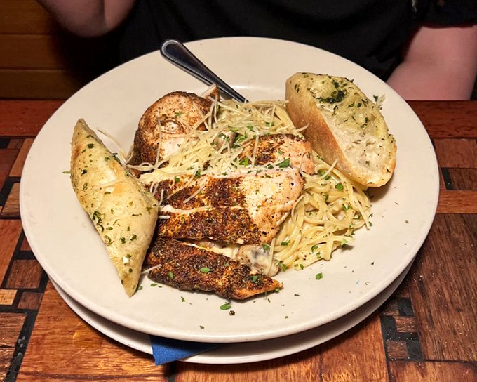 Blackened chicken alfredo that proves sometimes the best seafood restaurants know their way around a chicken too—a delicious insurance policy for landlubbers.