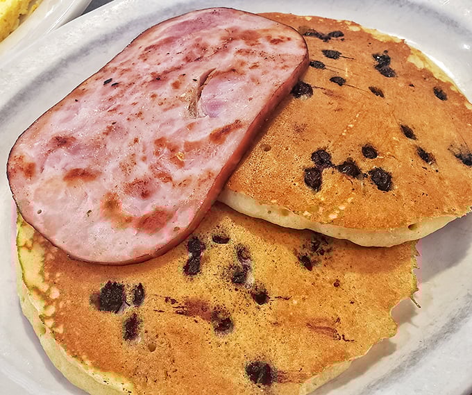 Blueberry pancakes with a side of ham&mdash;breakfast's perfect marriage of sweet and savory that makes getting out of bed completely worth the effort.