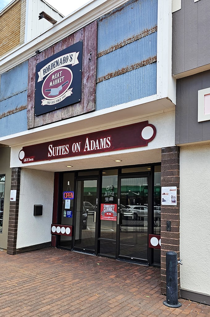 Bordenaro's Meat Market and Suites on Adams blend historic charm with modern function. Behind that rustic signage lies the promise of locally-sourced proteins that would make any grill master weep with joy.