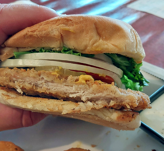 The pork tenderloin sandwich&mdash;where the meat decided to grow so large it needed to annex neighboring counties just to fit on the bun.