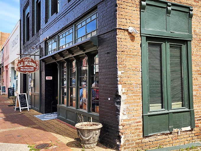 Cafe La Fleur's storefront beckons with the kind of charm that suggests someone actually cares about details and atmosphere.