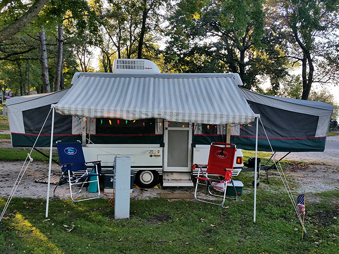 Campsite living at its finest&mdash;where "roughing it" still includes string lights and folding chairs. The original tiny house movement has been happening at Black Hawk Lake for generations.