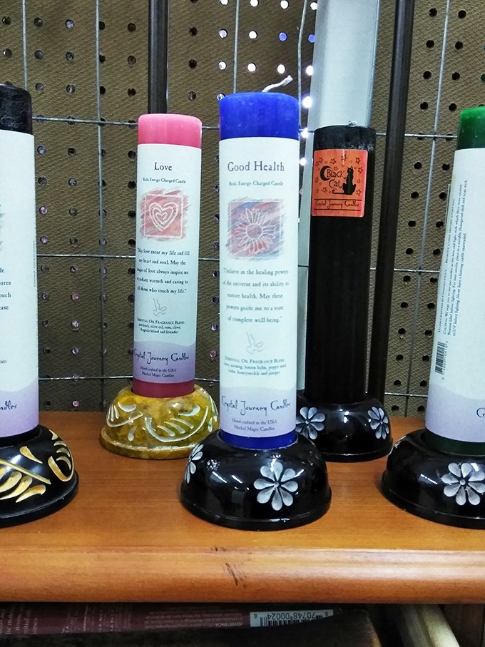 Spiritual candles promising "Love" and "Good Health" stand like sentinels of hope—proof that we all seek a little magic in our lives.