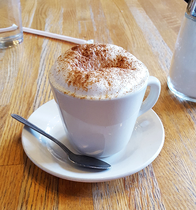 A cappuccino dusted with cinnamon that doesn't just wake you up&mdash;it gives you a reason to be awake.