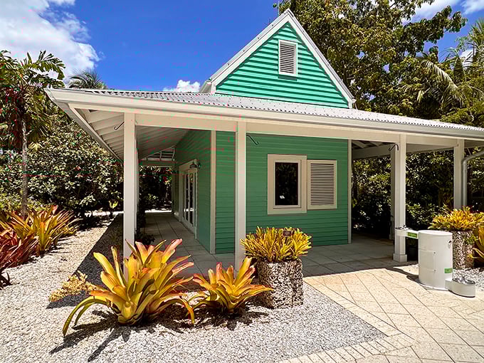 Caribbean charm in the Sunshine State. This vibrant green cottage surrounded by tropical bromeliads transports visitors to island life without the passport.