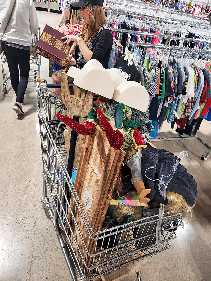 The thrifter's victory lap: a cart brimming with potential. Those ruby slippers might actually be magical at these prices.
