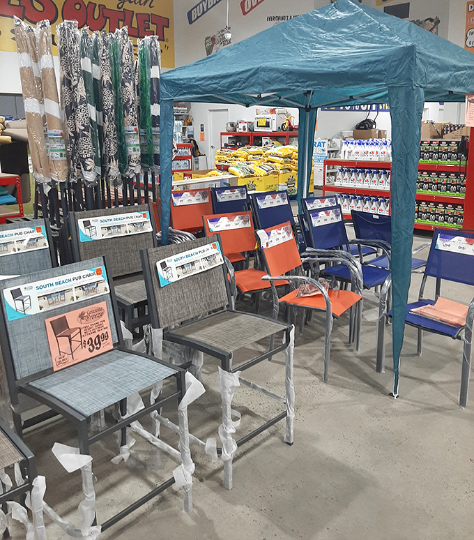 Patio furniture display that whispers, "Your backyard could look like this." Summer entertaining just got more affordable and stylish.