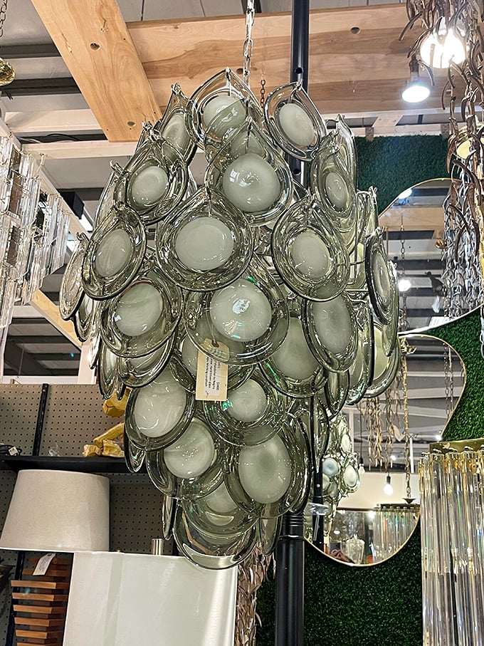 This stunning glass disc chandelier proves that sometimes the most eye-catching antiques aren't from the past but inspired by it.