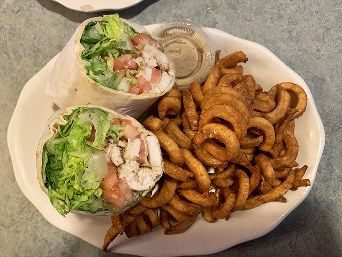 These wraps and curly fries are the dynamic duo of lunch—Batman and Robin if they were delicious and didn't fight crime.