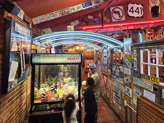 Even the entertainment is delightfully old-school, with a claw machine surrounded by enough license plates to start a small DMV office.