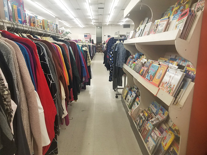 Literary treasures neighbor colorful garments in this corner of organized chaos, a reminder that both stories and style get second chances.