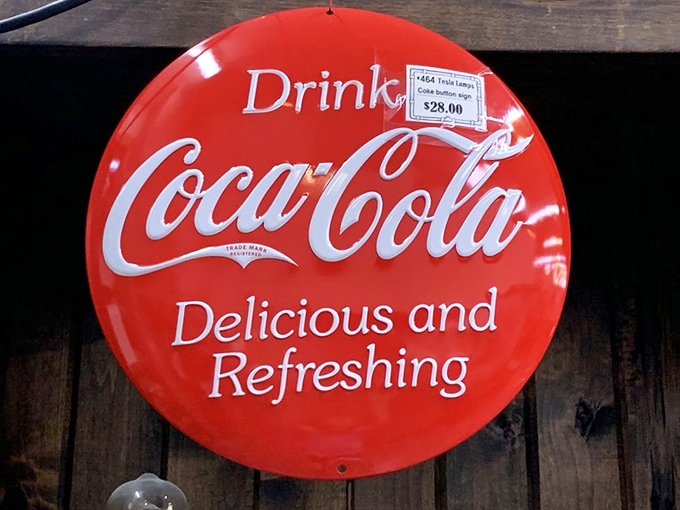 This vintage Coca-Cola button sign would make Don Draper swoon&mdash;advertising memorabilia that transforms walls from boring to brilliant.
