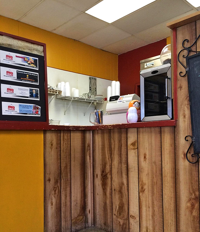 The heart of the operation &ndash; where magic happens behind wooden panels. Those handwritten specials aren't suggestions; they're commands from the culinary gods.