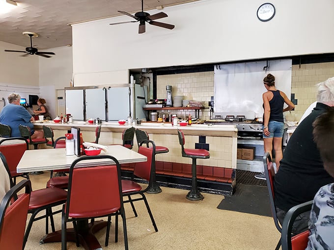 The counter seating&mdash;where solo diners become part of the Coffee Cup family and breakfast becomes dinner theater with a front-row seat.