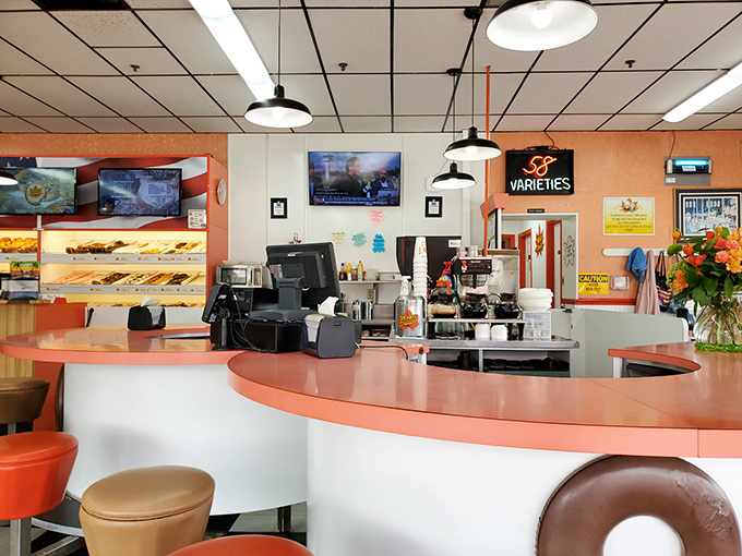 The counter where magic happens. Orange and white decor that's remained delightfully unchanged while food trends come and go.
