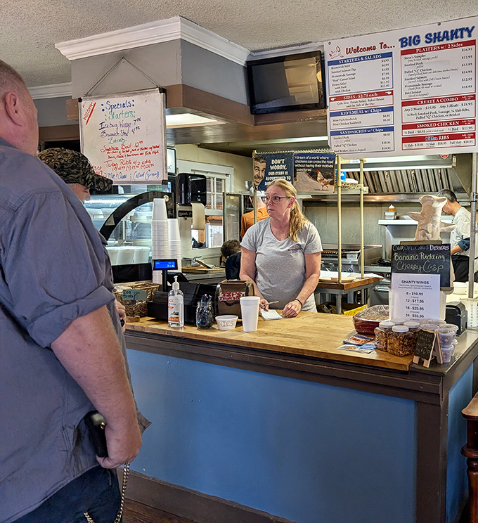 At the counter, barbecue dreams become reality as friendly staff translate your cravings into trays of smoky satisfaction.