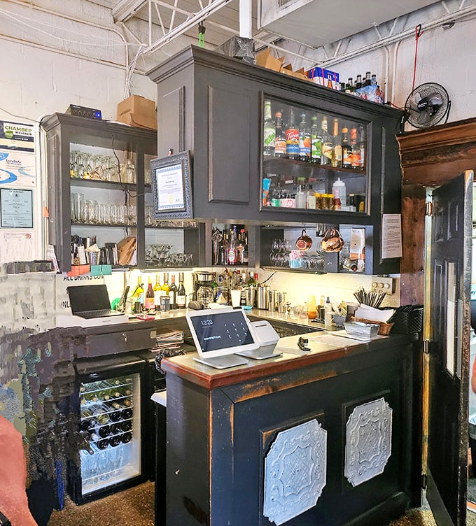 The bar area speaks to Main Street Caf&eacute;'s dual identity &ndash; part elegant dining establishment, part neighborhood watering hole where everybody knows your name.