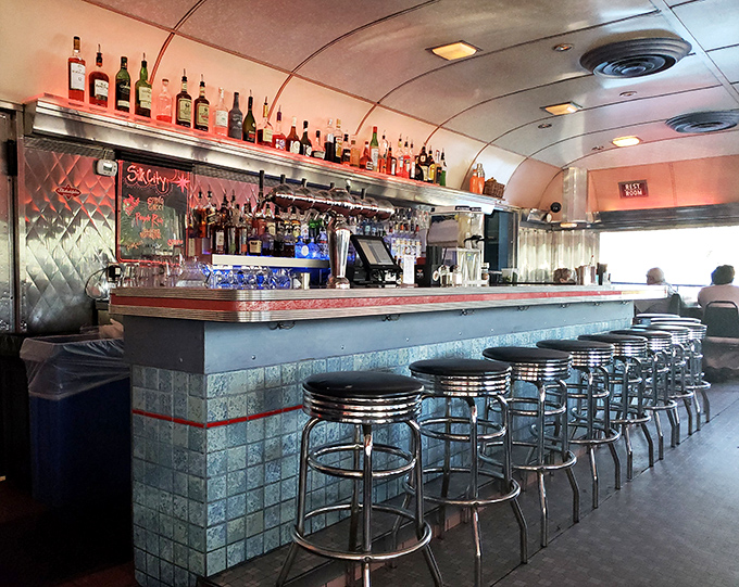 Chrome stools line up at the bar like soldiers, ready for patrons seeking craft cocktails and conversations that stretch long into the Philadelphia night.