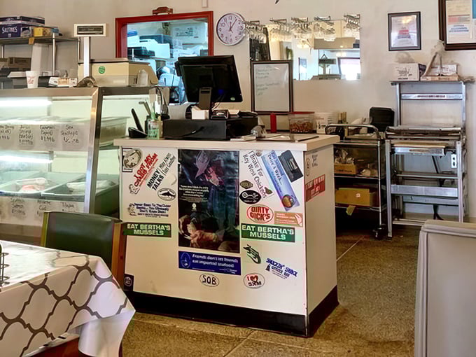 Where the magic begins&mdash;a humble counter that serves as the gateway between hungry customers and seafood nirvana. The stickers tell stories of loyalty.