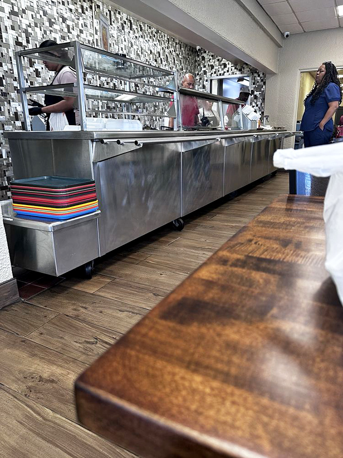 The serving line&mdash;where dreams come true and diets go to die. Those colorful trays stacked at the ready know they're about to witness culinary joy.