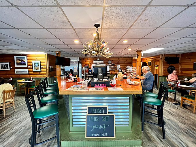The antler chandelier hanging from the drop ceiling perfectly captures that North Georgia mountain charm &ndash; rustic elegance meets breakfast haven.
