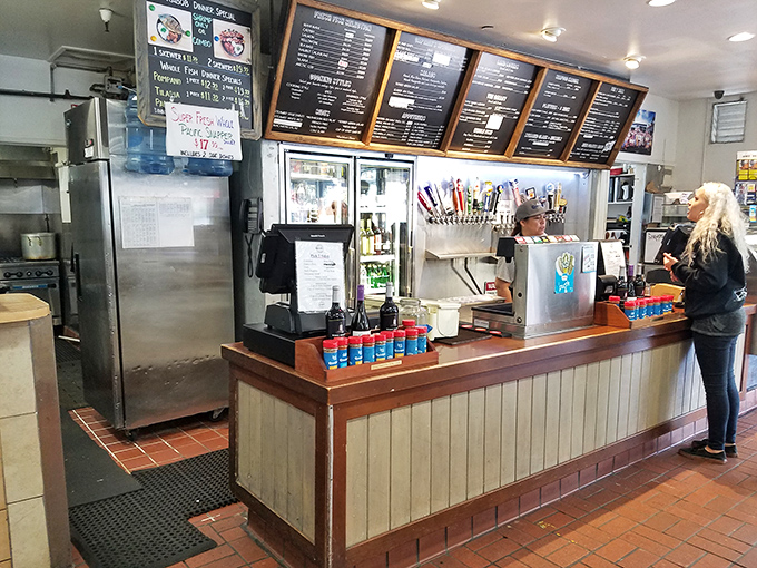 Where culinary magic begins – the ordering counter at Captain Kidd's. Like a seafood command center, this is where you'll make life-changing decisions about how that fresh catch meets your plate.