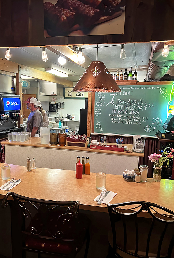 The counter seating &ndash; where solo diners become temporary family and copper pendant lights cast the perfect glow on your breakfast feast.