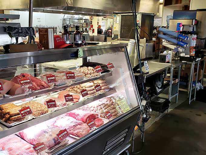 Behind the counter is where the magic happens. The staff moves with the choreographed precision of people who take meat very seriously.